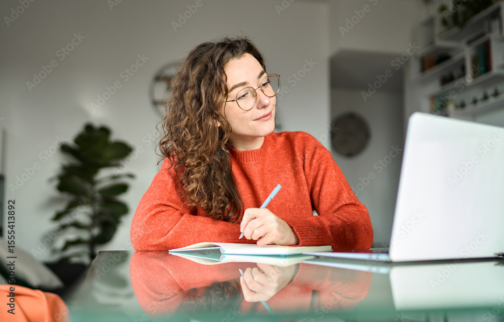 Young student woman student using laptop elearning, remote working at ...