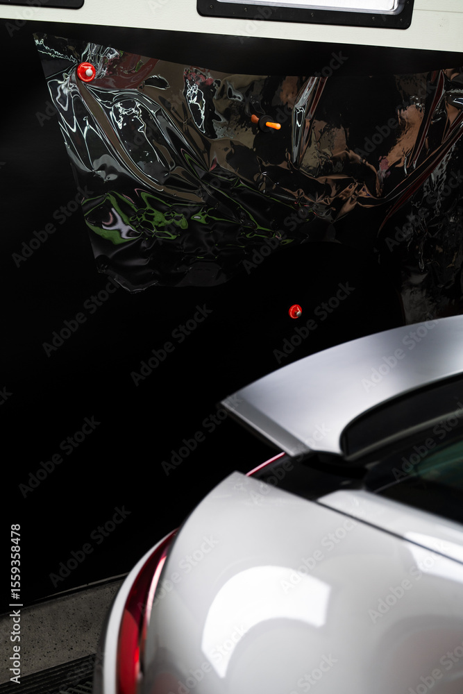 Vinyl wrap is manually cut using stencil over the film for precise ...