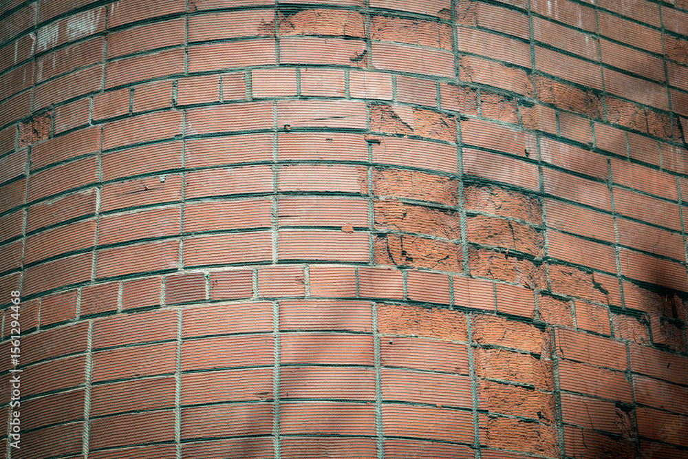 Weathered Brick Wall with Cracks and Uneven Surface Texture in Harsh ...