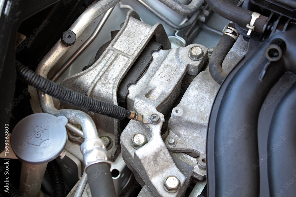 Upper engine mount close up. Gasoline engine parts. Engine mount in the ...