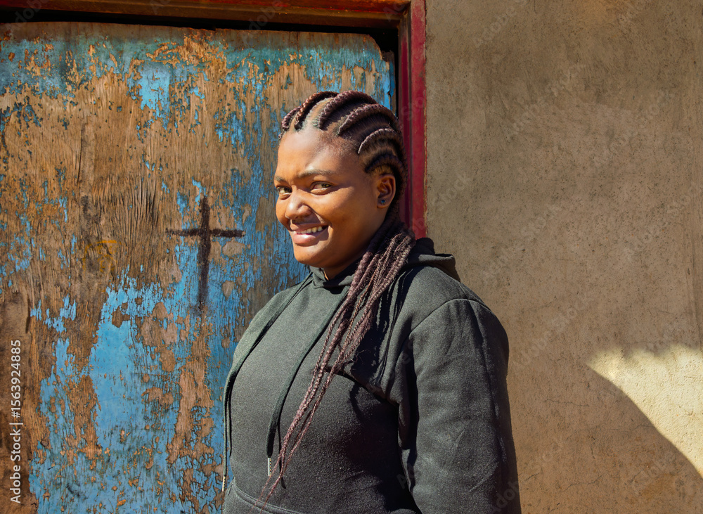 Stock-Foto „Africa village , african Christian woman with braids ...