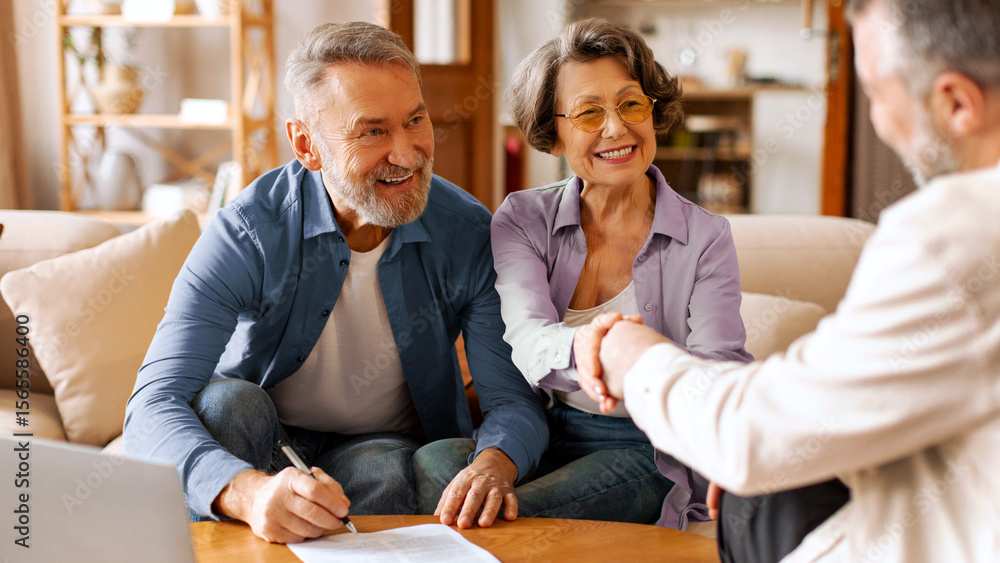 Happy senior couple making financial insurance estate deal, satisfied ...