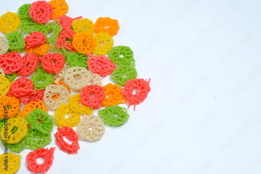 isolated white background original Indonesian raw crackers, uncooked ...