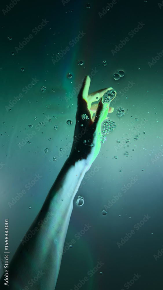 A Captivating Underwater Scene Featuring a Hand Reaching Upward ...