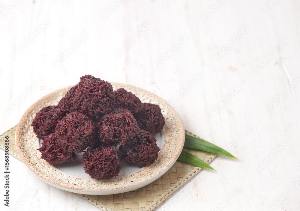 Grubi is a fried snack, made from long shaved sweet potatoes and so on ...