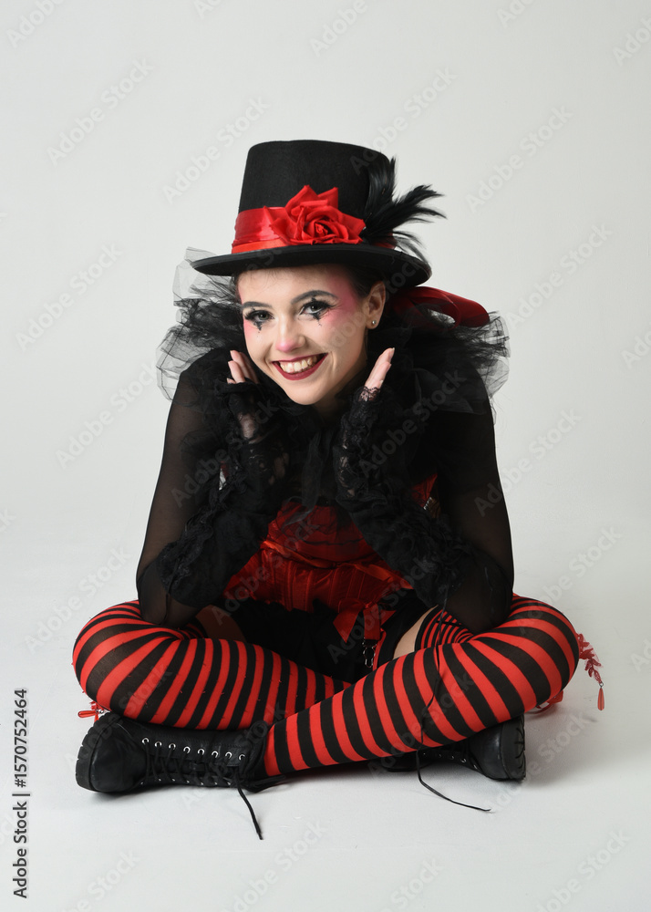 Burlesque circus performer, fantasy female model in halloween jester ...