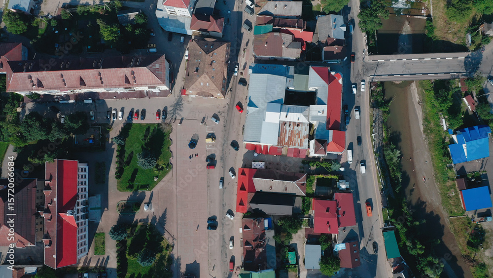 Charming small town streets with colorful rooftops and busy local ...