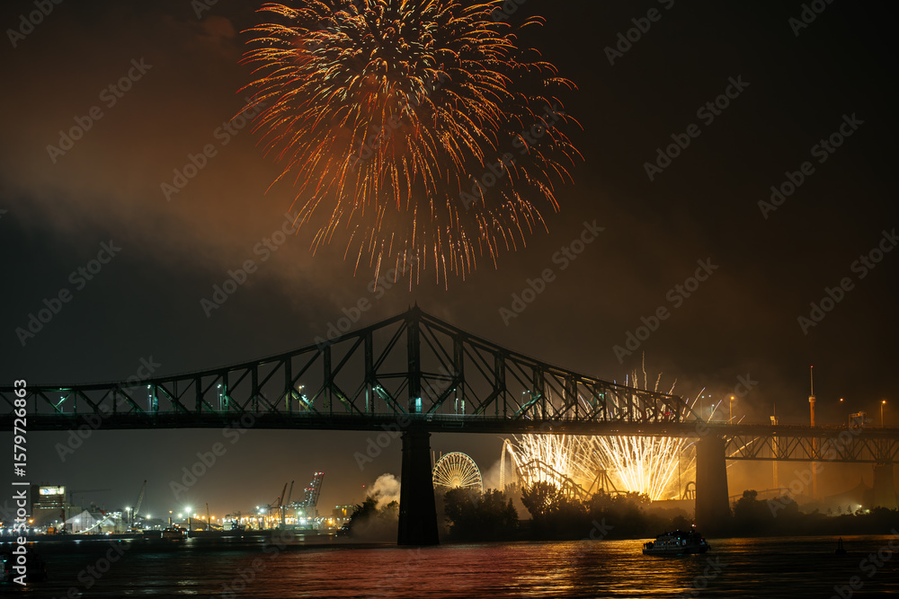 Drone flight through holiday fireworks above water with reflection on ...