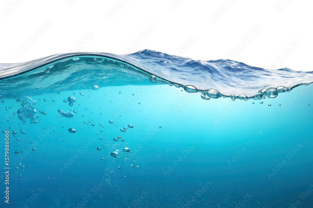 Close up of clear blue water with rising bubbles and gentle waves ...