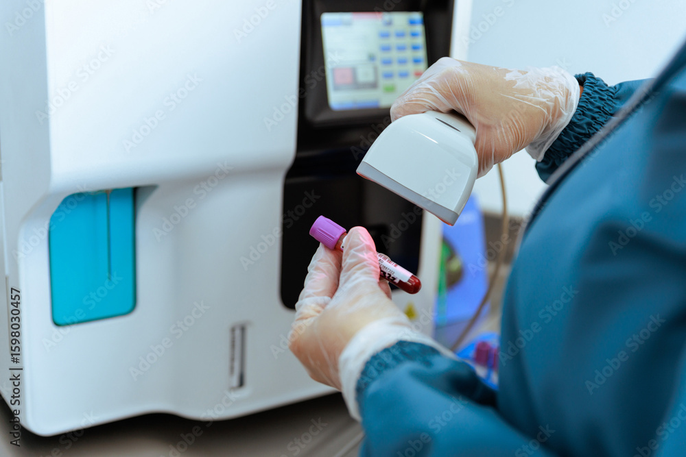 Lab Technician Scanning Blood Sample with Barcode Reader for Clinical ...