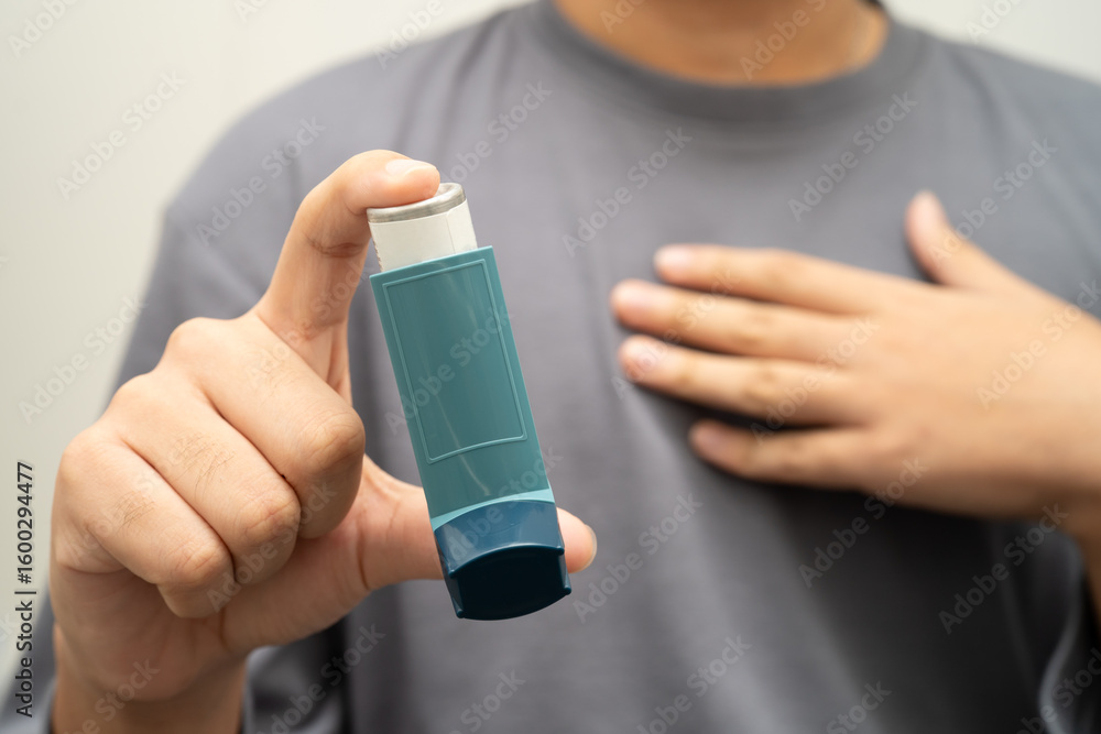 Asthma and chronic obstructive pulmonary disease COPD, Asian young man ...