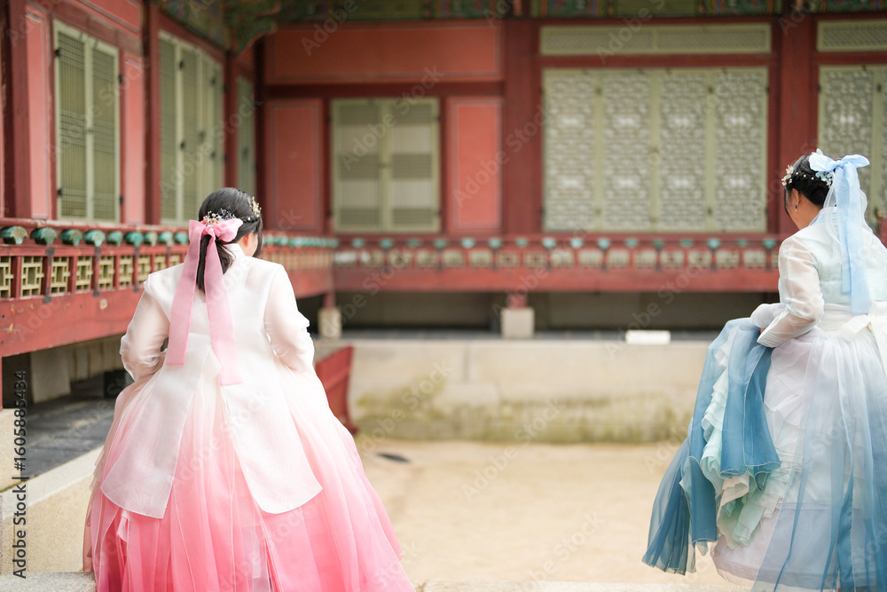 Seoul, June 2025: Two Korean women in their twenties stroll through ...
