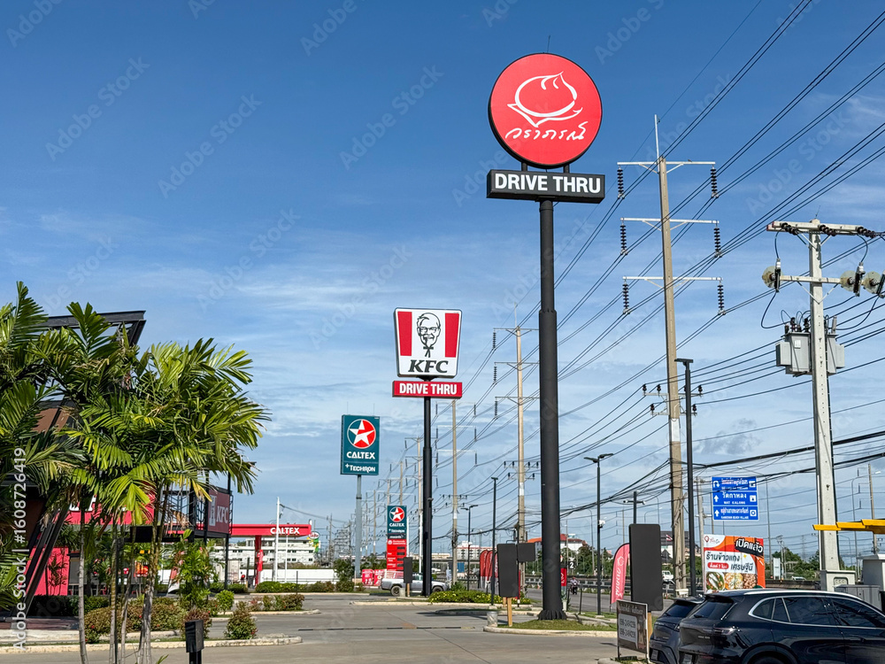 KFC and Caltex drive-thru signs along Highway 35 in commercial roadside ...