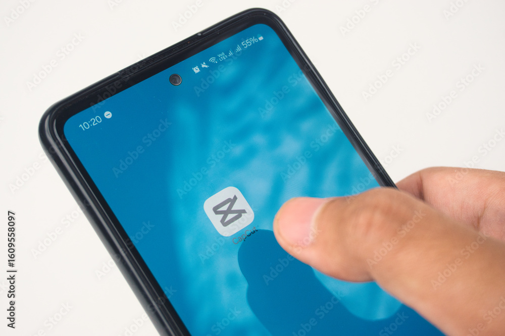 Smartphone Screen Displaying CapCut Video Editing Apps with Hand ...