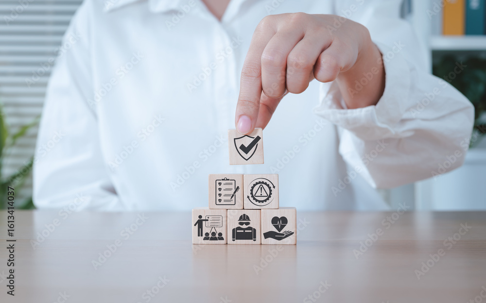 Photo Stock Work safety and compliance concept. Stacking wooden blocks ...