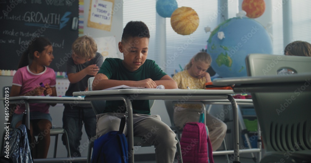 Foto de Stock Stressed African American Primary School Boy Sitting ...