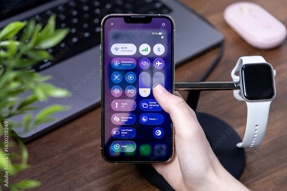 Poznan, Poland - July 29, 2025: A hand adjusts settings on a modern ...