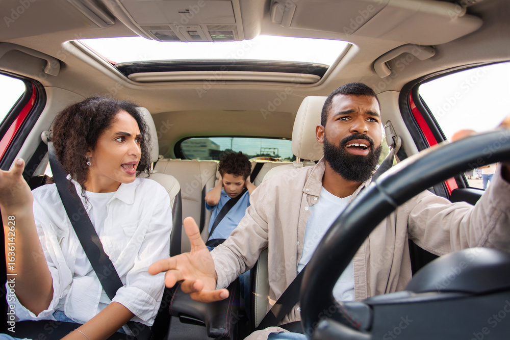 Latin parents arguing while driving car, kid boy feeling sad upset and ...
