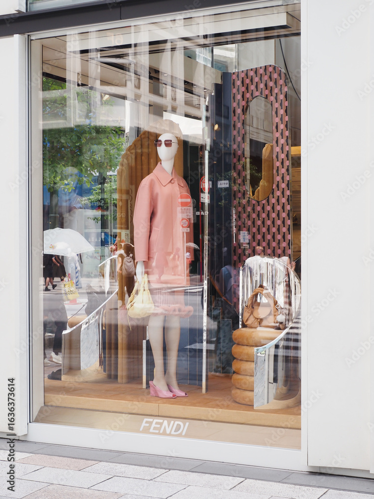 TOKYO, JAPAN - August 8, 2025: Detail of a display in the window of a ...