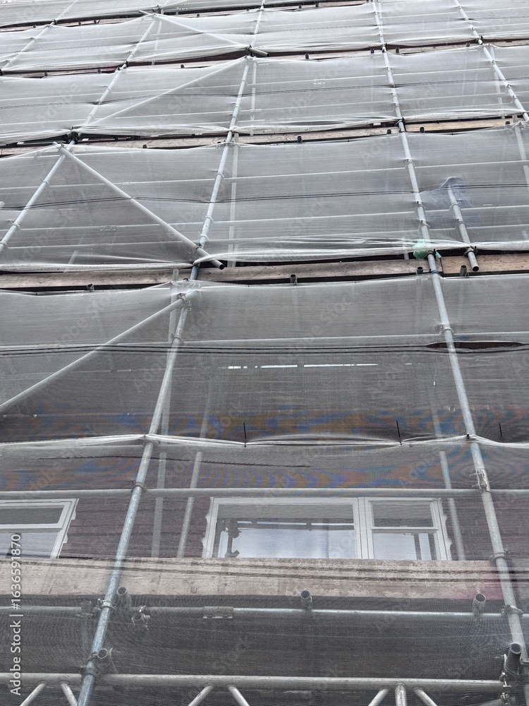 Building with Covered Scaffolding During Renovation Project Stock Photo ...