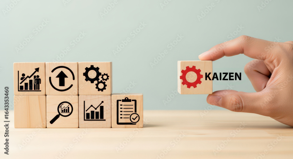 Foto de Stock Kaizen Continuous Improvement Hand Placing a Kaizen Block ...