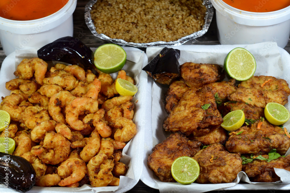 seafood dishes of Fried Epinephelus fish fillet, Fried shrimps, fish ...