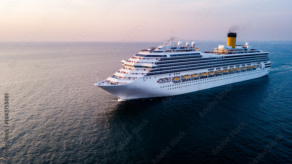 Cruise ships sail the sea, taking passengers or tourists on sea trips ...