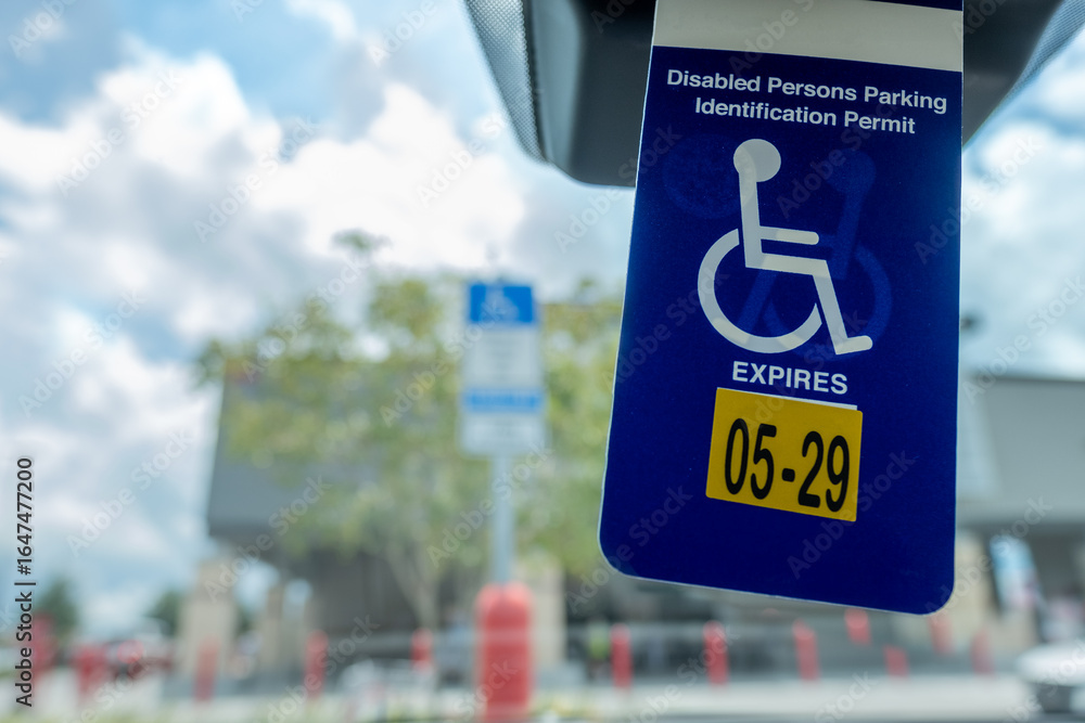 Handicap Parking Placard Hanging from Mirror in Automobile With ...
