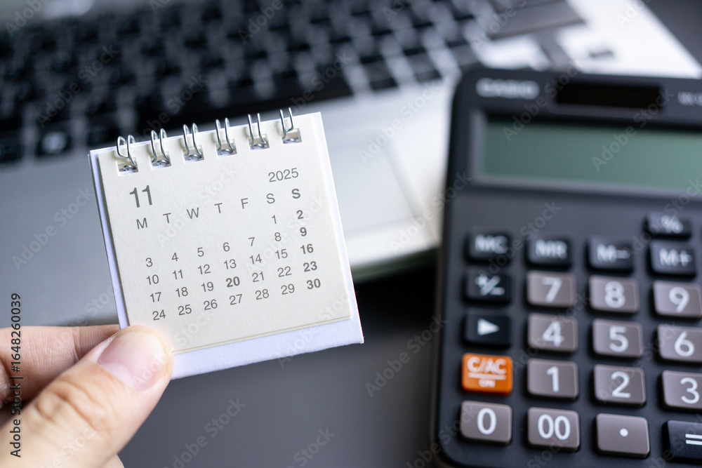 Desk Calendar with Calculator and Laptop for Business Planning in ...