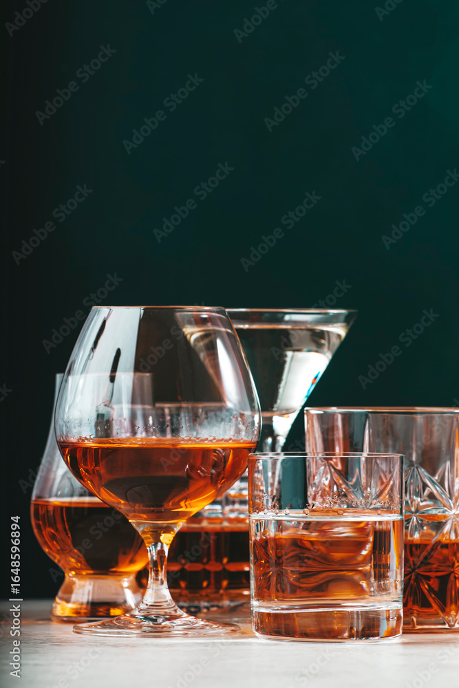 Strong alcoholic drinks set. Spirits, liqueurs, distillates etc. in ...