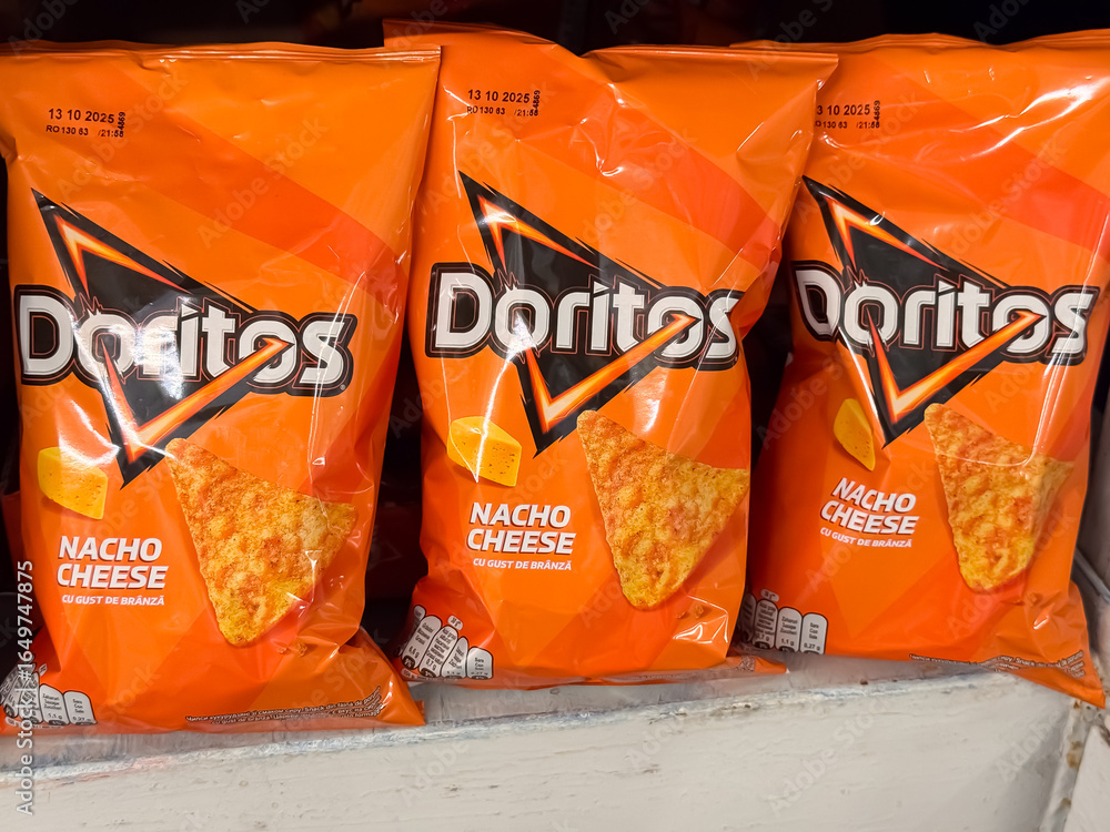 Doritos Nacho Cheese Flavored Chips in Bright Orange Bags with Bold ...