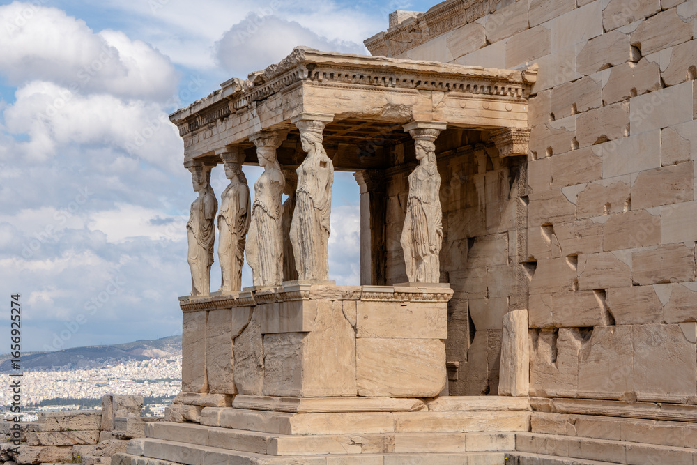 Caryatids, female columns, at the portico of Erechtheion at the Acropolis ruins in Athens ...