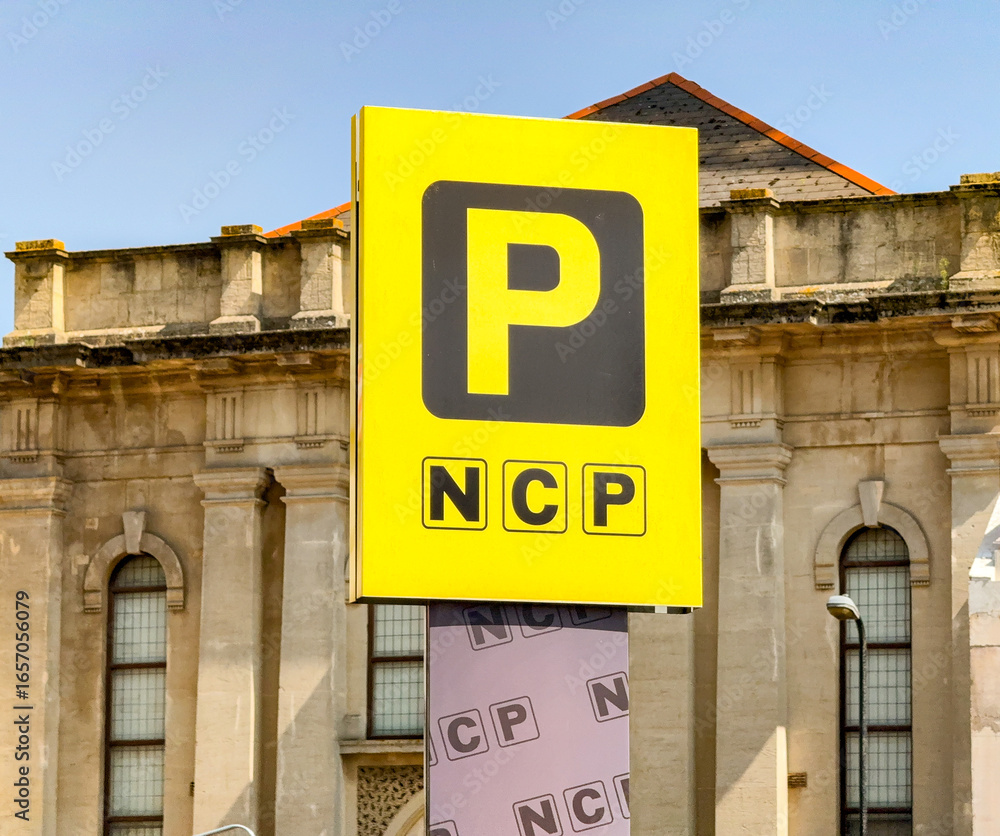 Cardiff, Wales, UK - 15 August 2025: Sign above an outdoor car park ...
