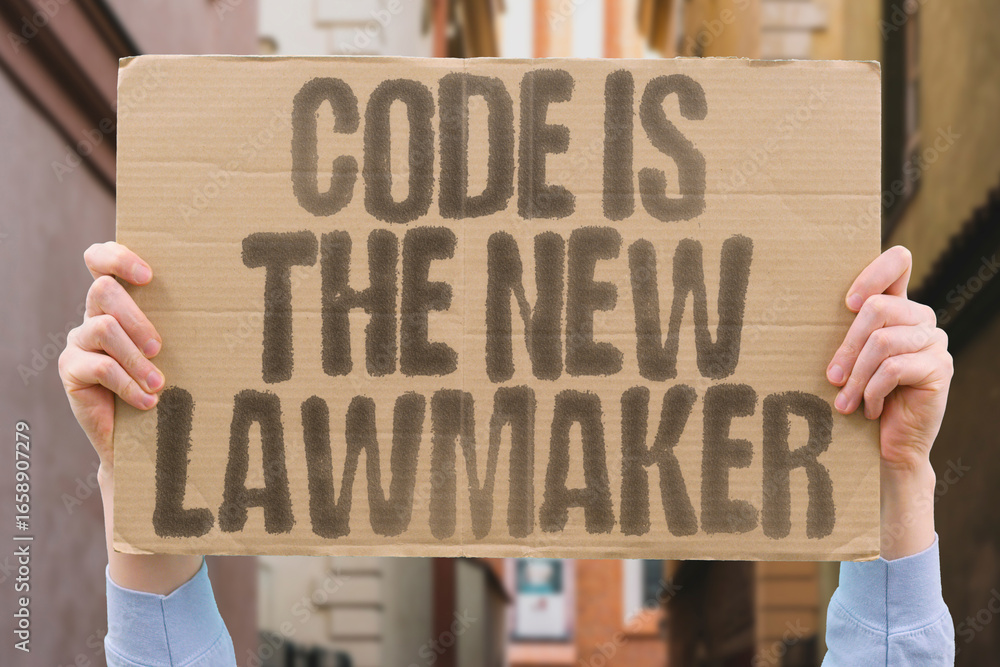 “Code is the new lawmaker” appears as a protest slogan about algorithm ...