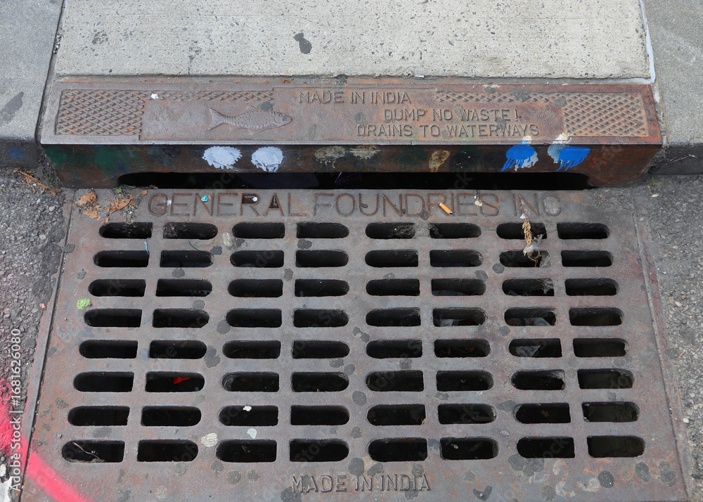New York, NY, USA - August 27, 2025: heavy storm drain on the sidewalk ...
