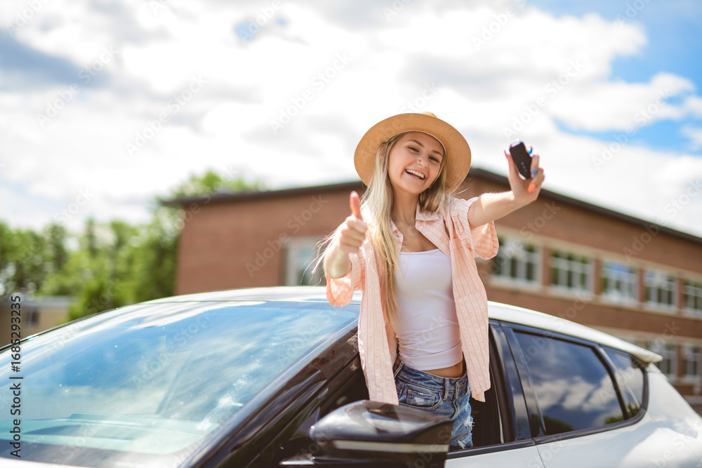 Beautiful young girl driver with with her white car Stock Photo | Adobe ...