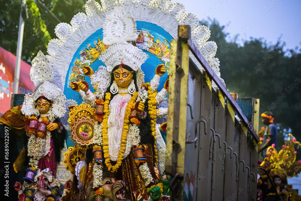 Durga Puja with idol of goddess Durga being transported for festival ...