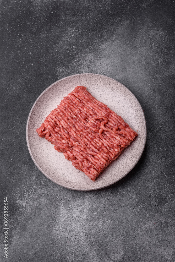 Raw ground beef or pork, fresh meat for burgers or other dishes. Raw ...