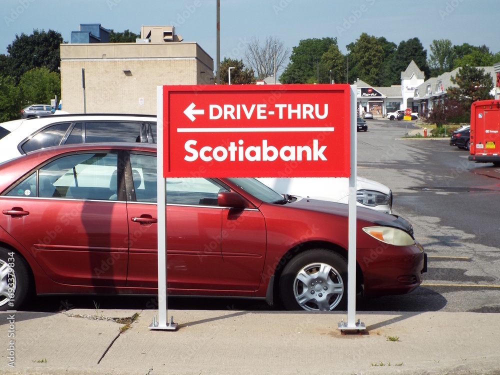 Kanata, ON, Canada, June 17, 2025: A bright red and white sign in a ...