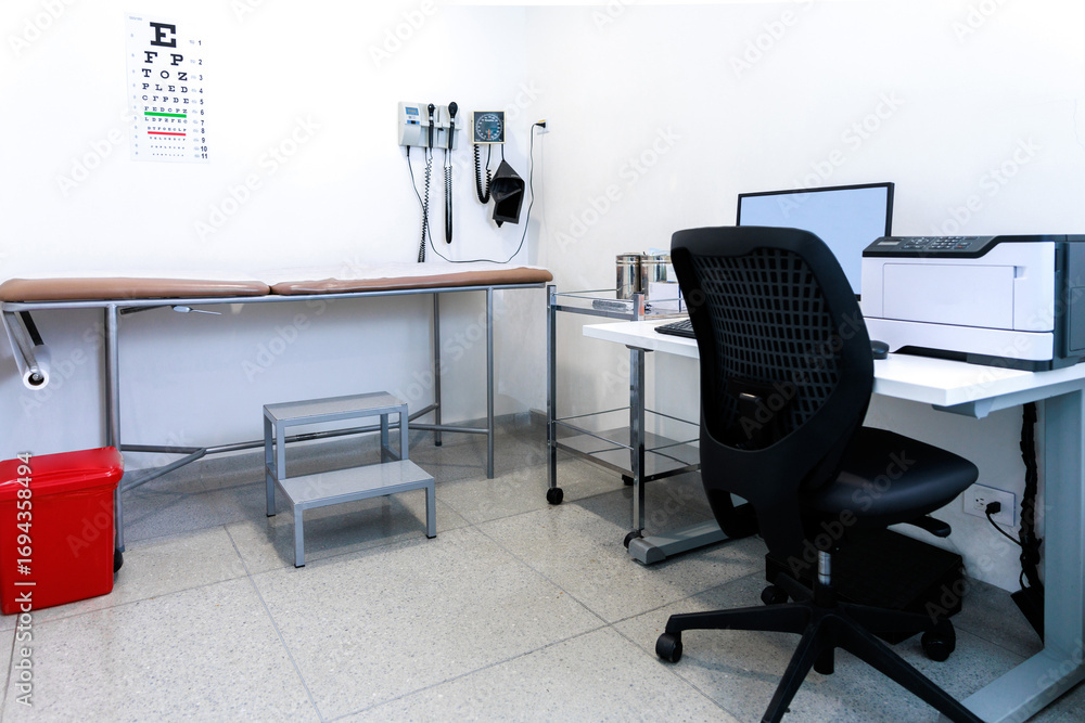Fully equipped medical examination room with diagnostic instruments ...