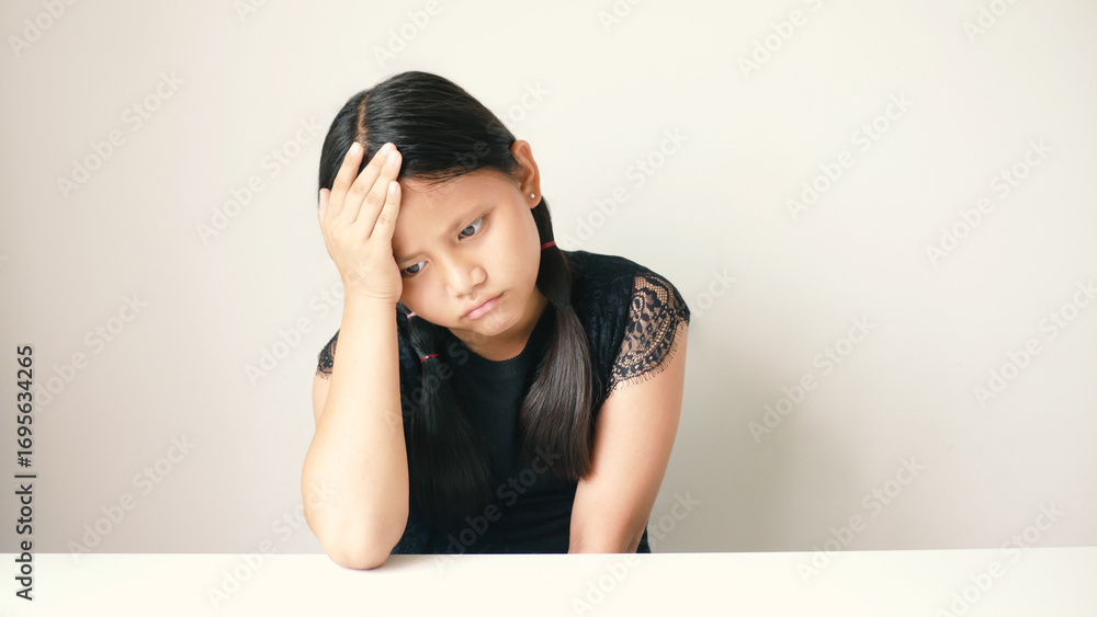 Stock-Foto „The little girl felt sad and her expression showed, her ...