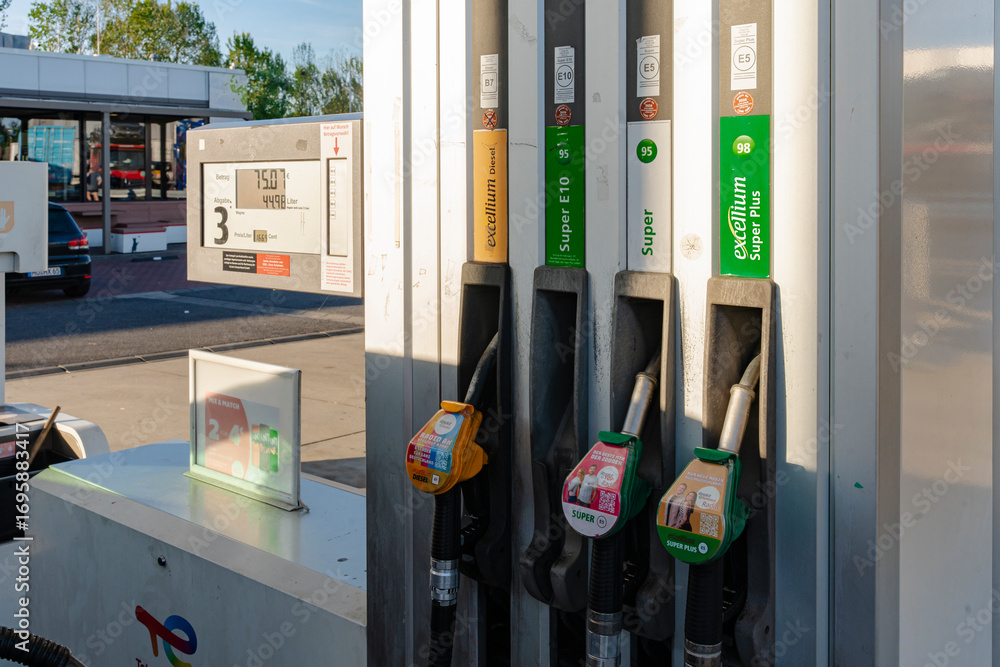 Fuel pump options with diesel, Super E10, Super, and Super Plus at a ...