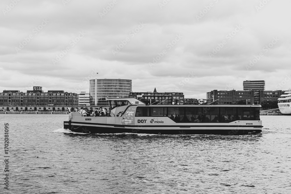 Copenhagen, Denmark- July 16, 2025: Yellow harbour bus serving as ...