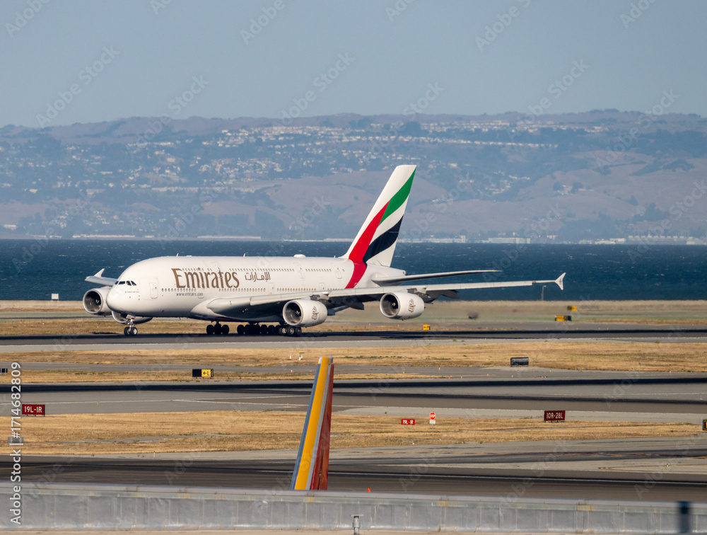 Seattle, WA - 30 August 2025: Emirates A380 passenger jet departing on ...