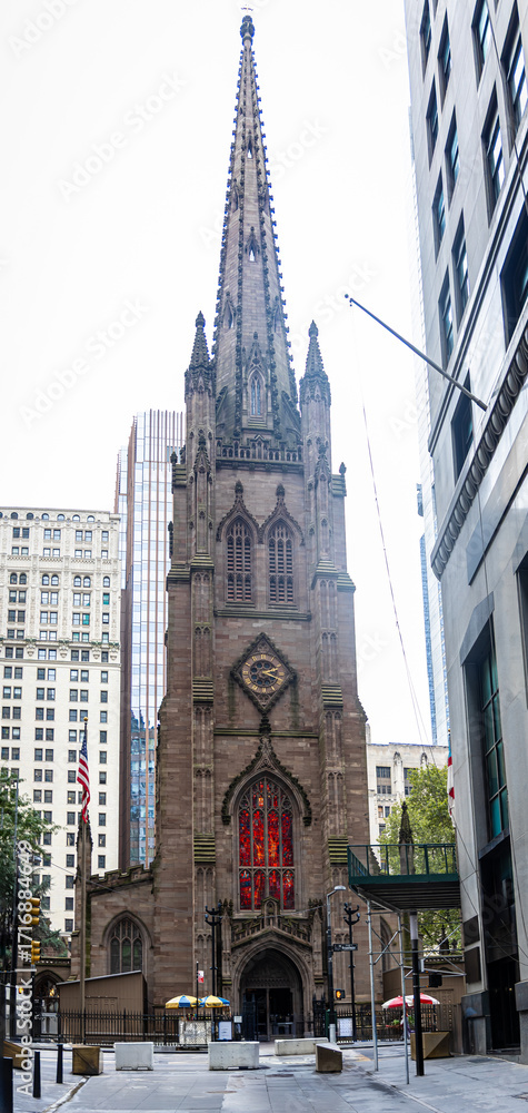 Historic Trinity Church with tall spire in Lower Manhattan NYC Stock ...