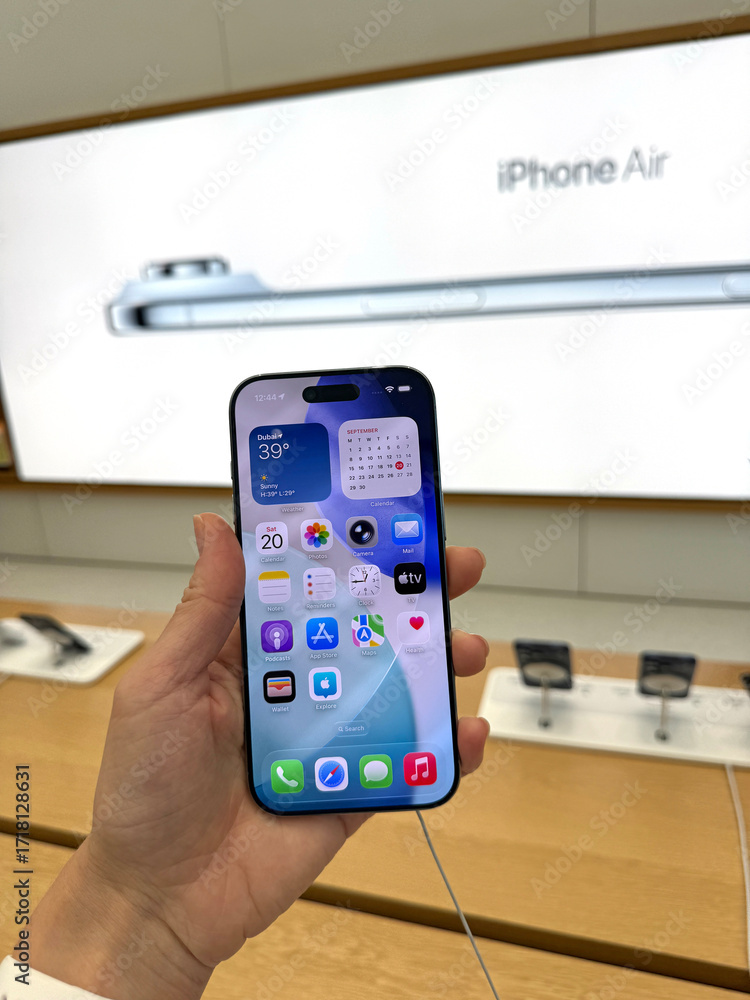 Dubai, UAE, 20 September 2025. iPhone 17 held in hand at Apple Store ...