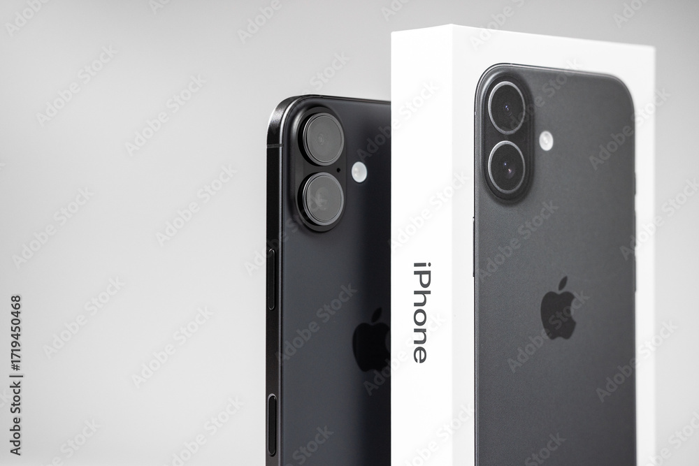 Apple iPhone 17 Upright Next to Packaging Box against Light Background ...