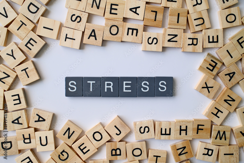 Stress word in wooden cube blocks, mental pressure concept, anxiety and ...