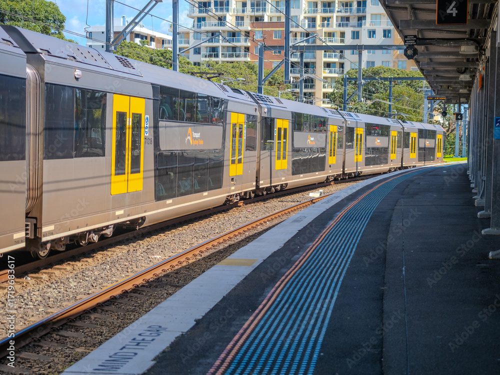 Stock-Foto „22 September 2025 Commuter Train fast moving through a ...