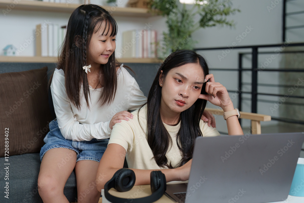 Sibling Support. Young girl comforting older sister during study time ...